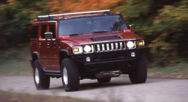 General Motors Debuts The Pontiac Vibe & Hummer H2 SUV At The 2002 LOS ...